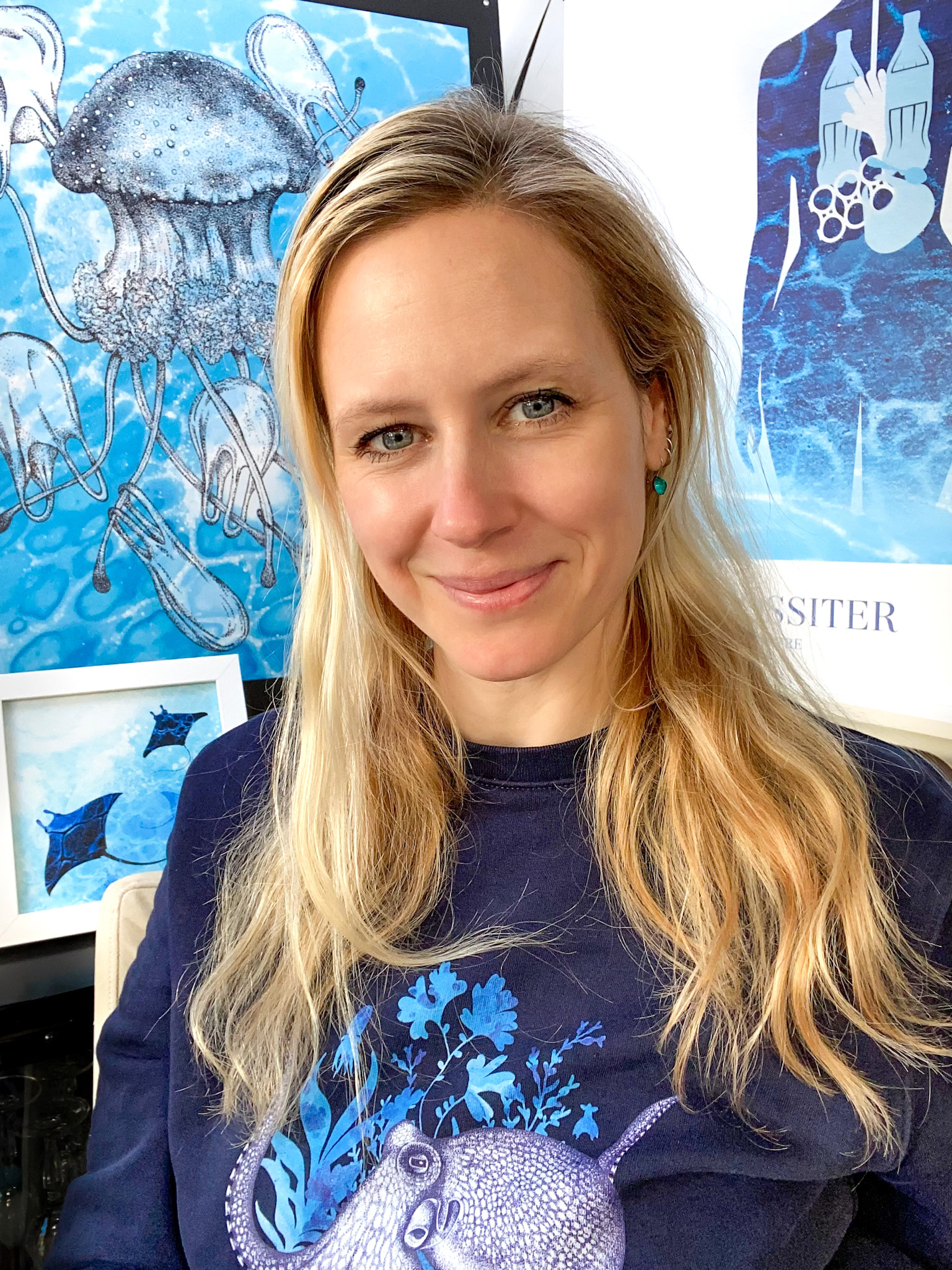 ARTivist Janina Rossiter draws the blue line to protect the Ocean ...